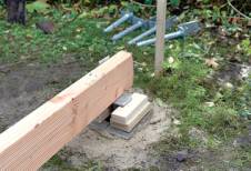 installing and leveling your deck using pre fab footings and fixing the ...